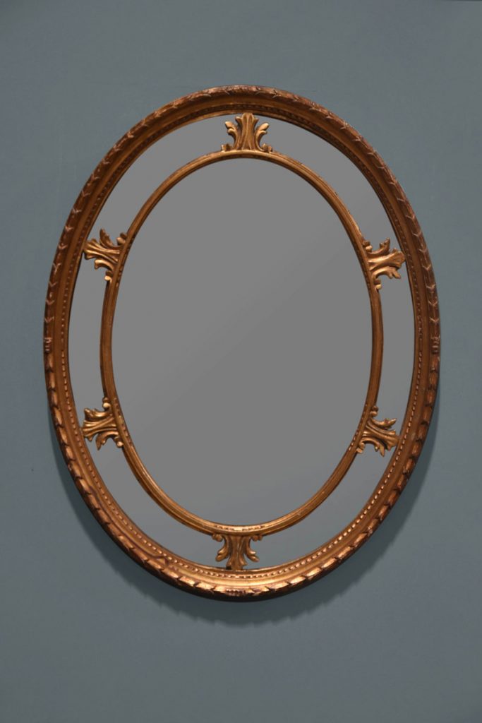 Carved Oval 7 Panel Gilt Mirror - The Classic Prop Hire Company